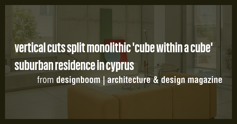 vertical cuts split monolithic 'cube within a cube' suburban residence ...